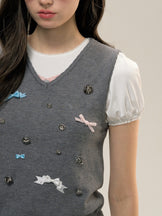 Knit V-Neck Ribbon Metal Nichi Button Vest – ARCANA ARCHIVE